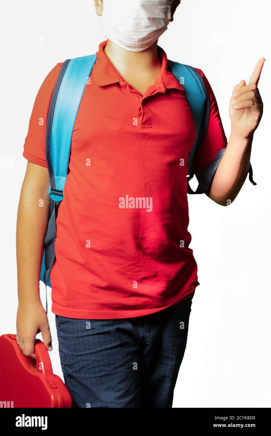 kid boy wearing backpack standing over isolated white background Stock ...