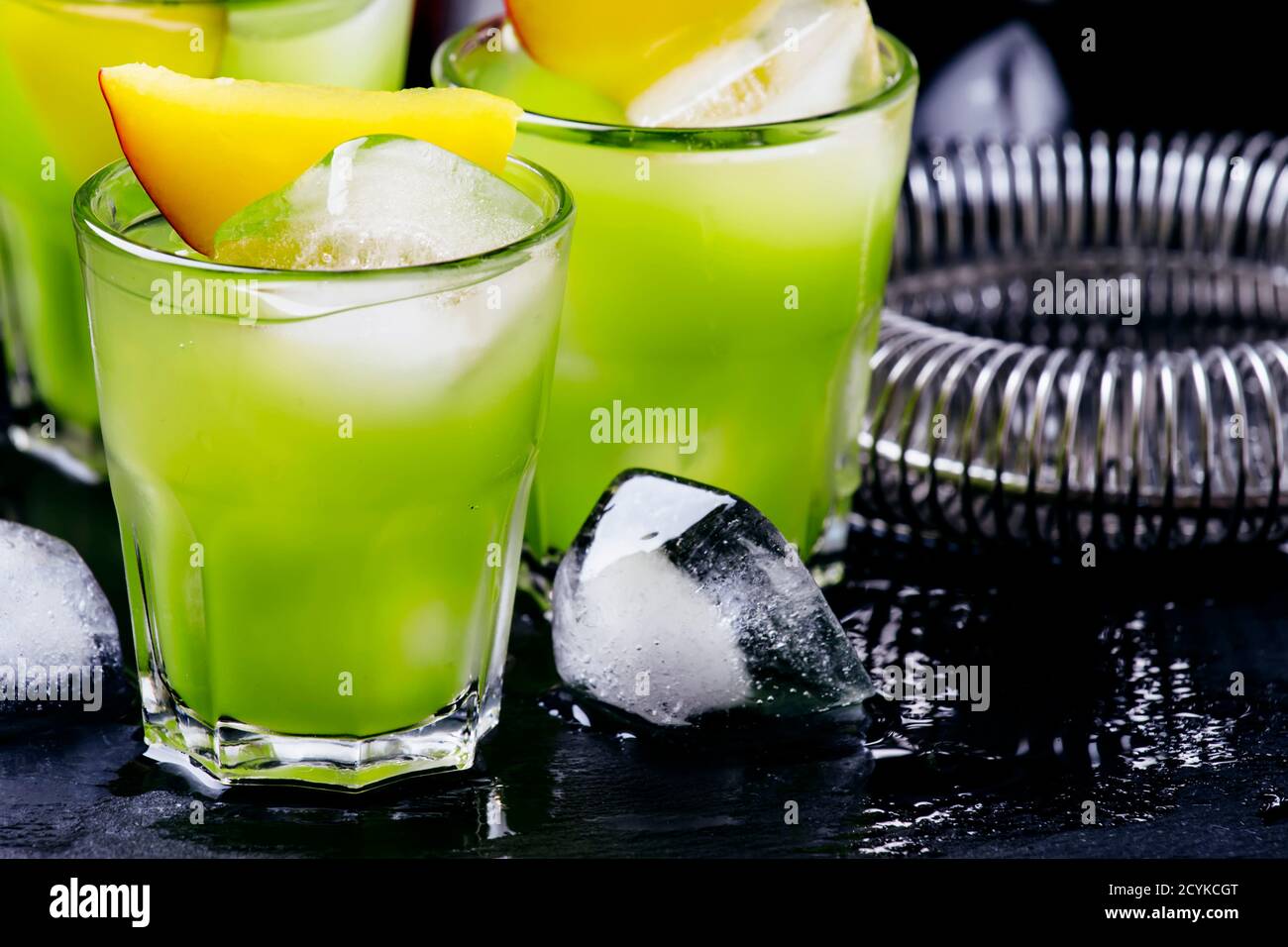 Alcoholic cocktail Aztec, with gold tequila, blue curacao liqueur ...