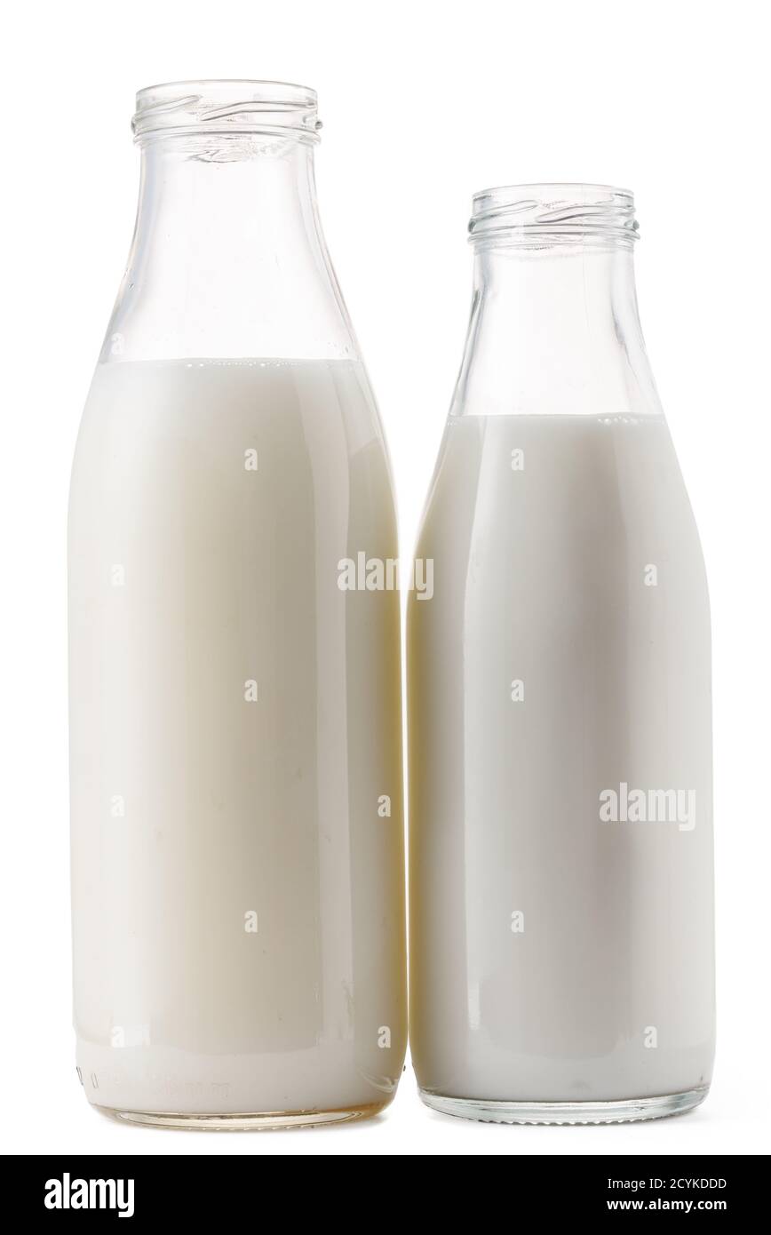 Open glass bottle of milk isolated on white Stock Photo - Alamy