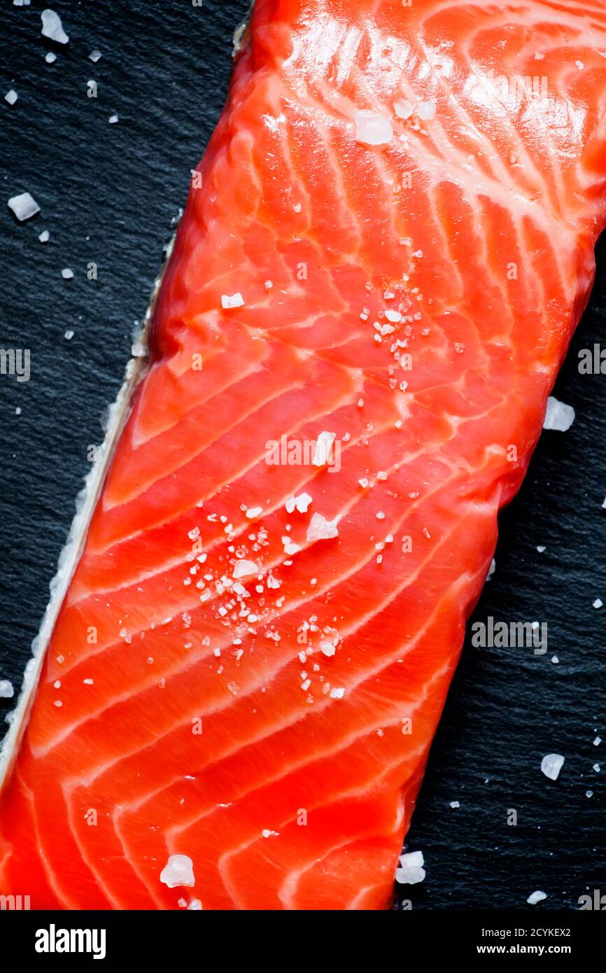 Salty salmon and sea salt, top view Stock Photo - Alamy