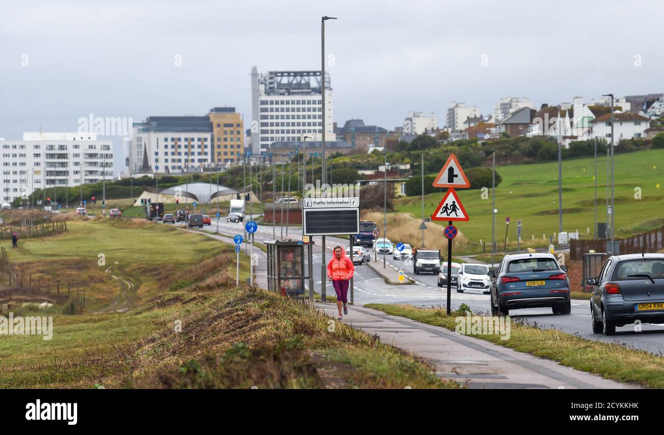 Runner makes way along hi-res stock photography and images - Alamy