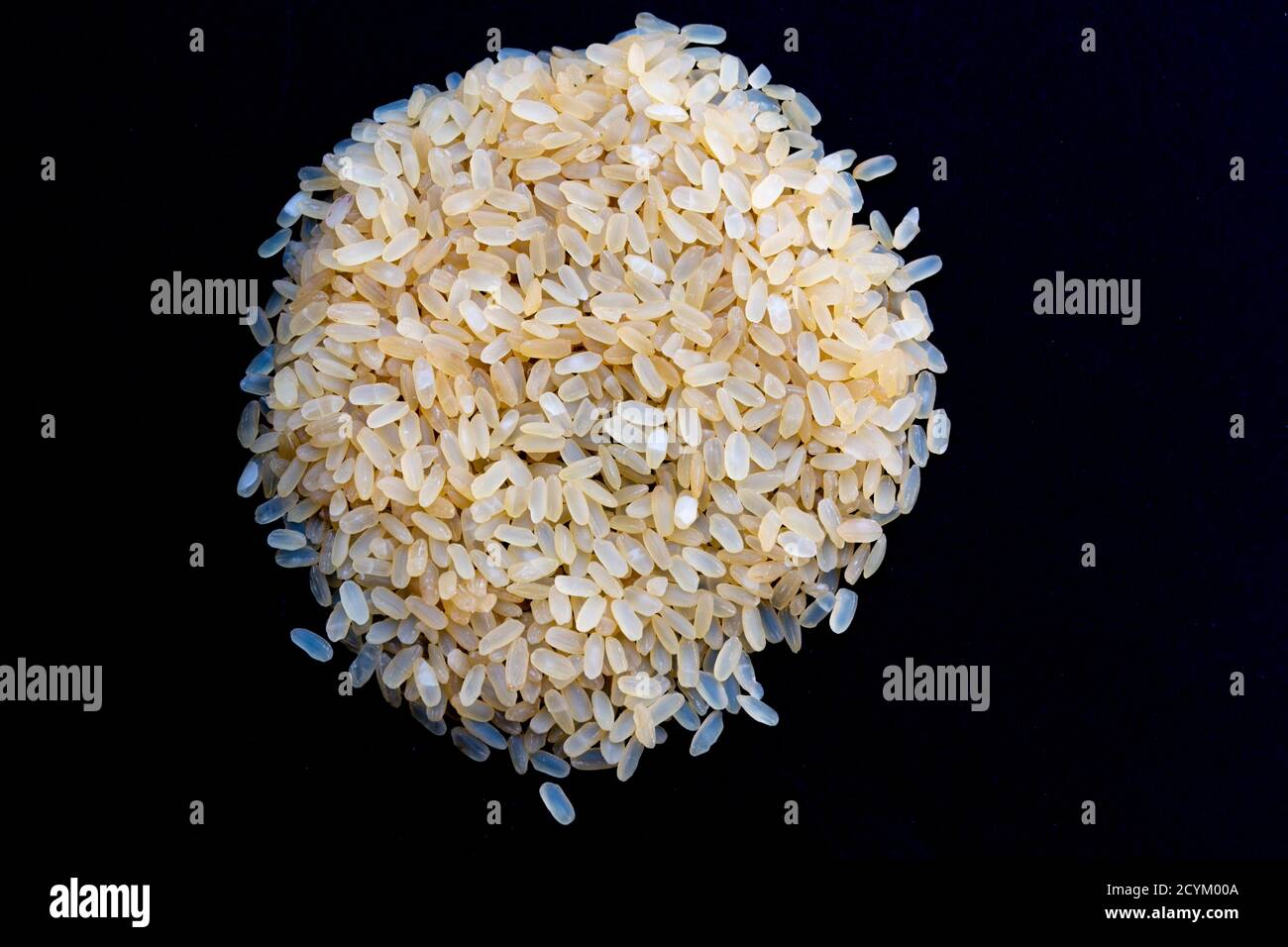 Close up of yellow rice on background Stock Photo - Alamy