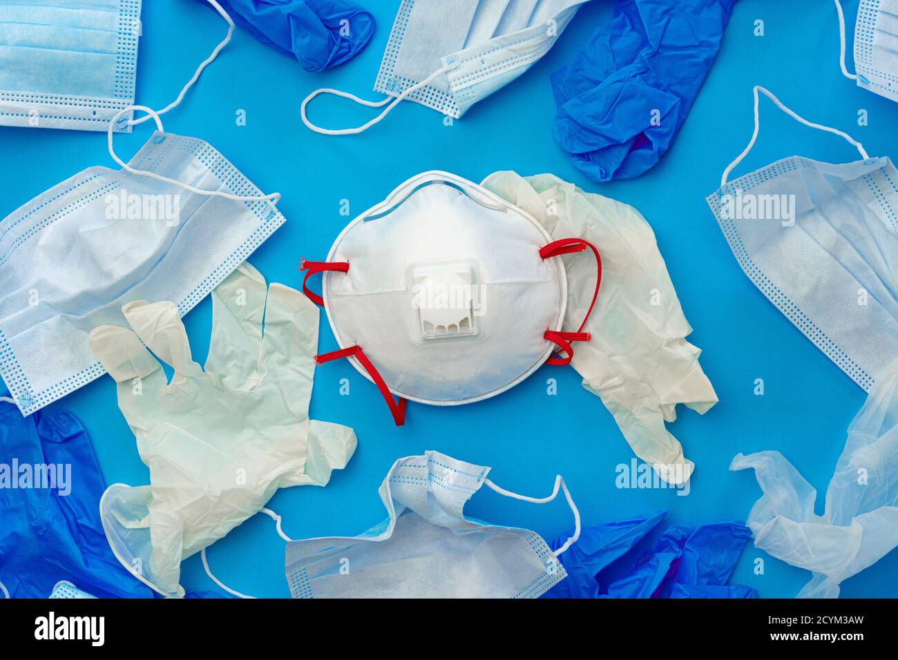 Protective equipment, masks and gloves, on blue background Stock Photo ...