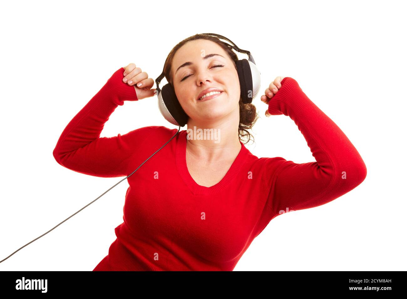 Happy young woman dancing with headphones Stock Photo - Alamy