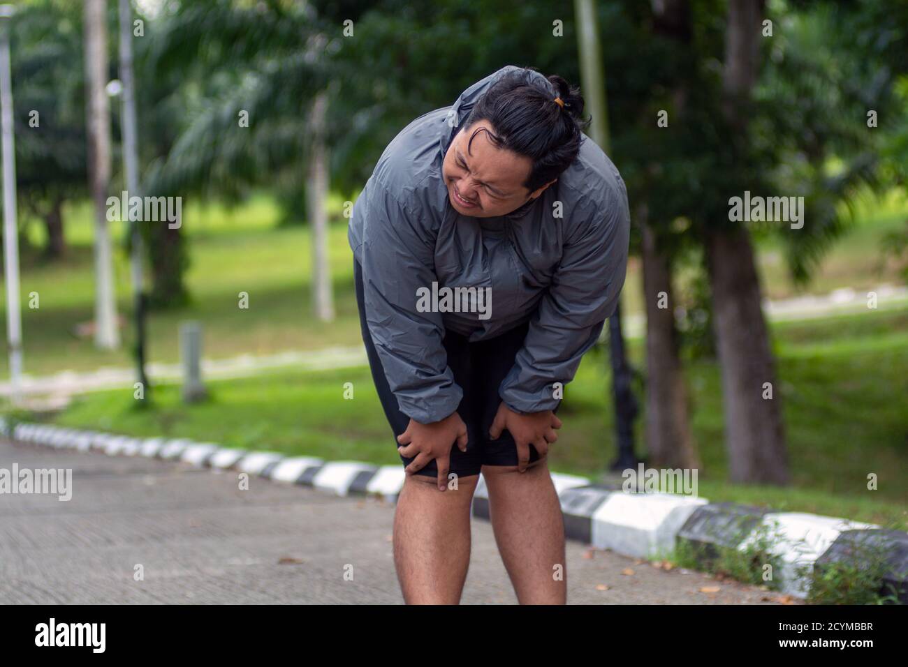 Overweight man running hi-res stock photography and images - Alamy