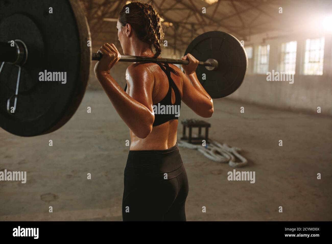 Woman squats rear view hi-res stock photography and images - Alamy