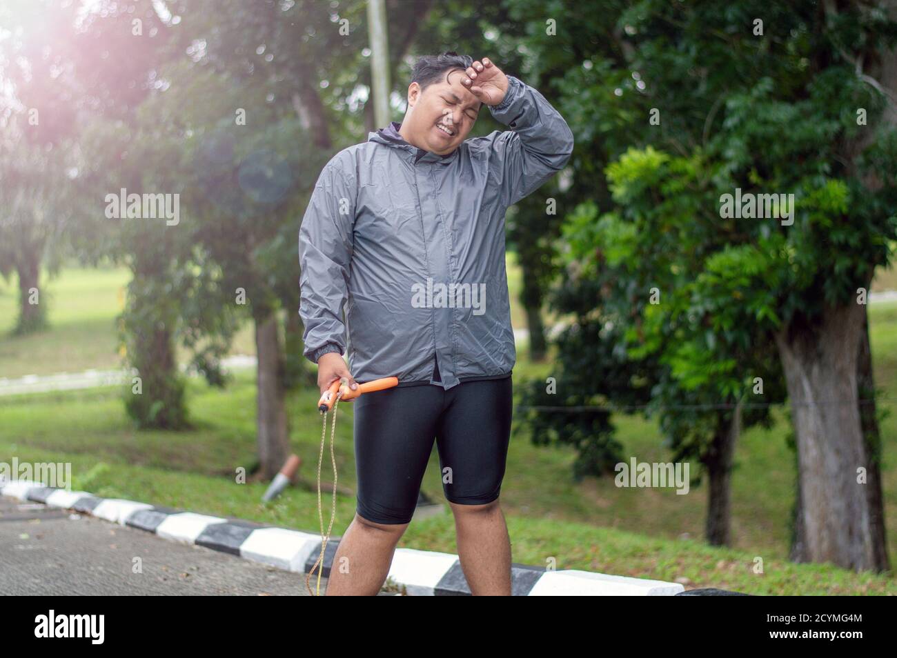 Obese Exercise Routine For Men Overweight Man Doing Dumbbell Curls And