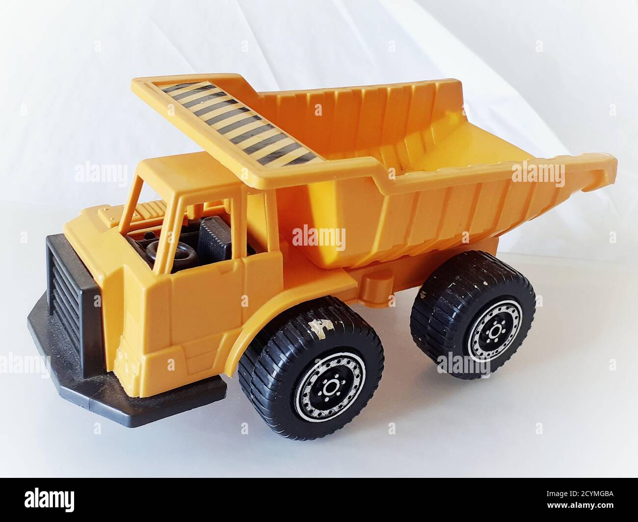 Plastic toy tipper truck hi-res stock photography and images - Alamy
