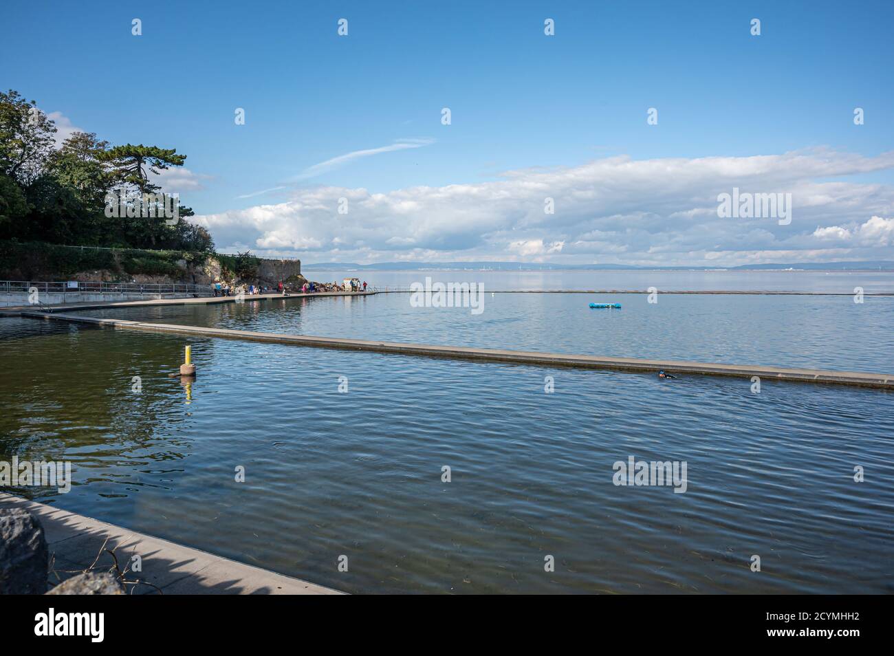 Marine swimming lake with town in background, Clevedon, Somerset, UK ...