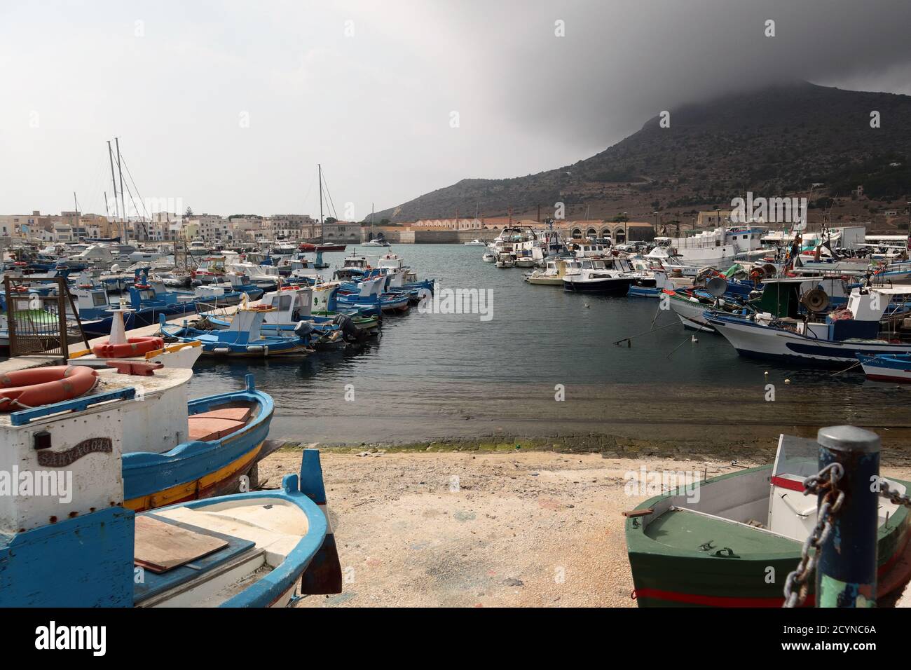 Harbor with sailing and fishing boats Favignana Sicily Stock Photo - Alamy