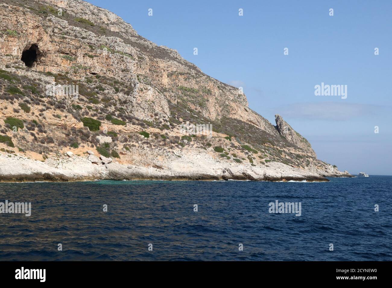 Cave entrance in a rocky promontory on the island of Levanzo Sicily ...