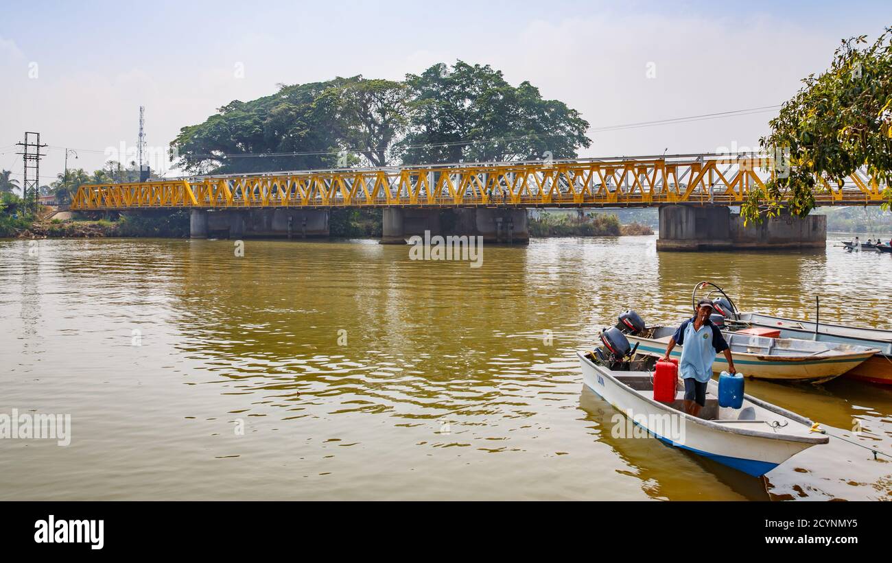 Papar, Sabah, Malaysia: Local fishermen working on Papar River near the ...