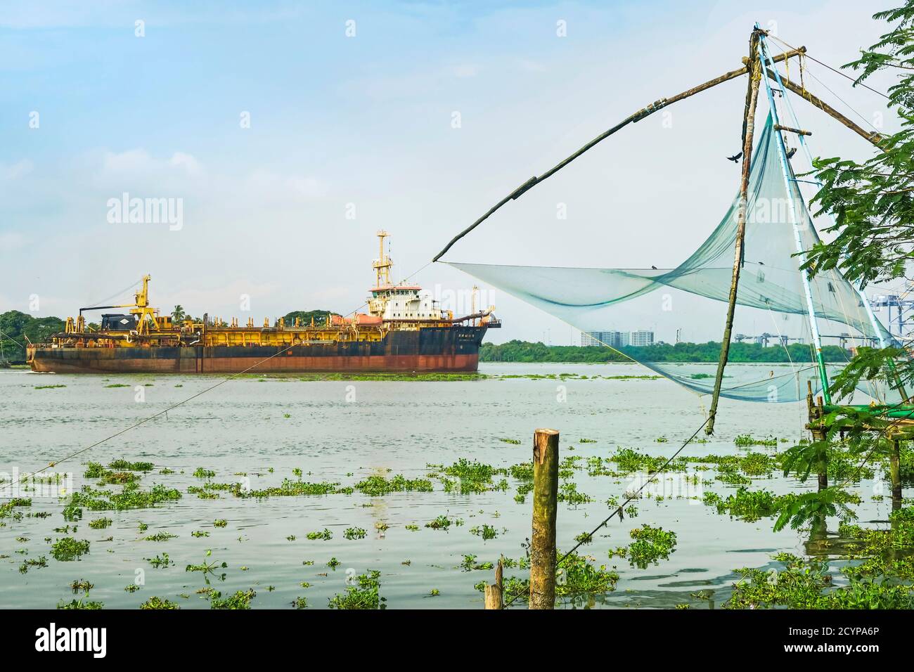 Dredger ship & Chinese fishing net on Vembanad Lake near Vallarpadam ...