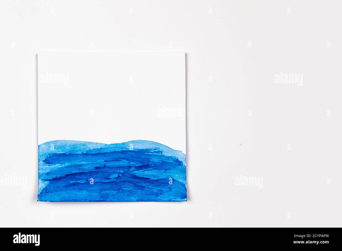 Watercolor hand painted waves illustration on the paper with copy space ...