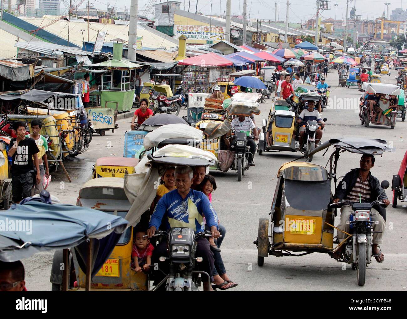 Filipino tricycles hi-res stock photography and images - Alamy