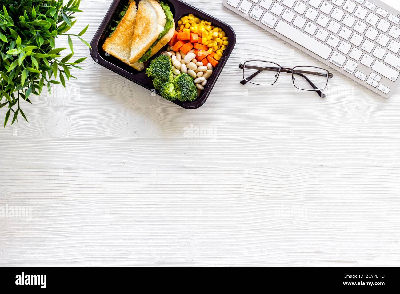 Lunch at workplace. Delivery boxes with meal, top view Stock Photo - Alamy