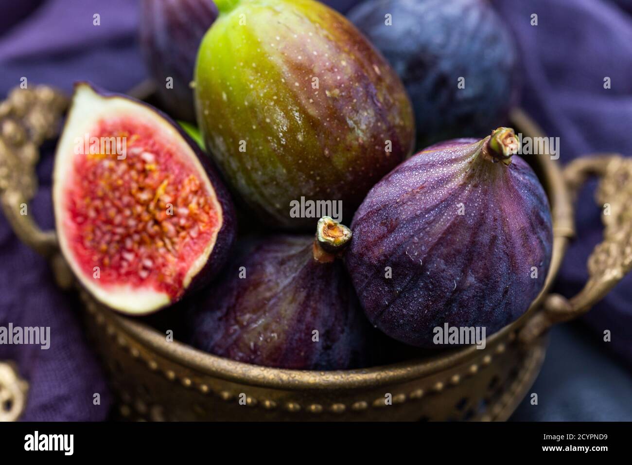 Closeup shot of fresh fig in a basket Stock Photo - Alamy