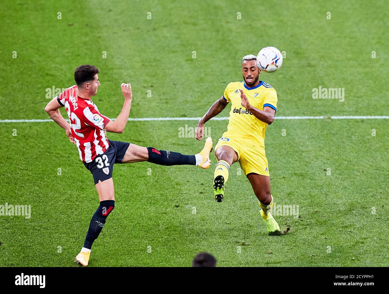Carlos Akapo of Cadiz and Jon Morcillo Conesa of Athletic Club during ...