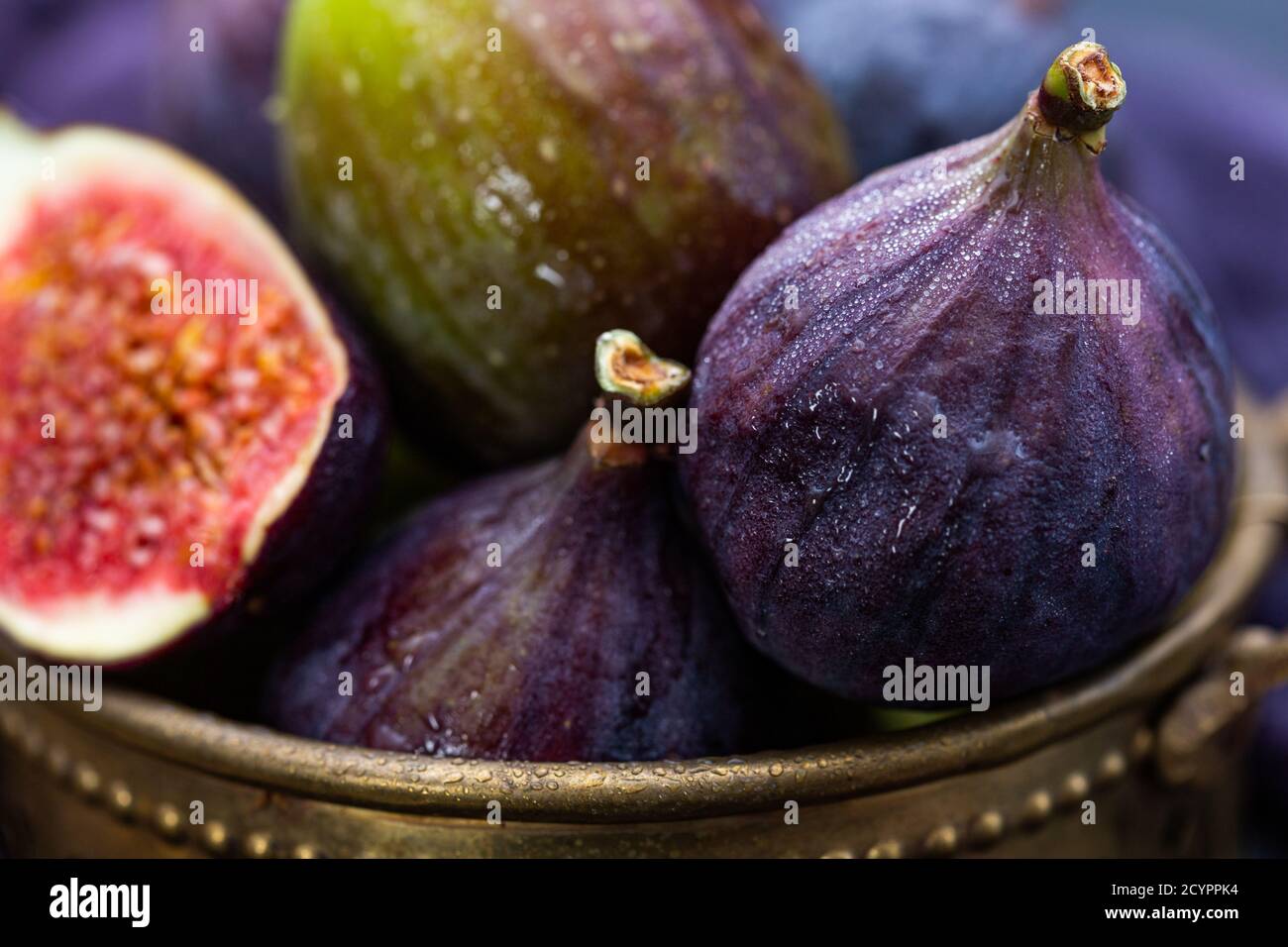 Closeup shot of fresh fig in a basket Stock Photo - Alamy