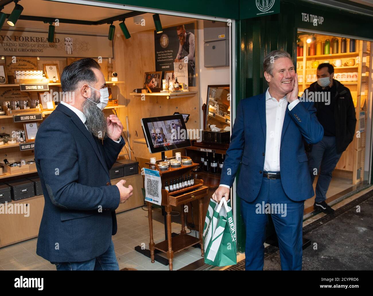Labour Party leader Keir Starmer meets shopkeeper George Garcia during ...