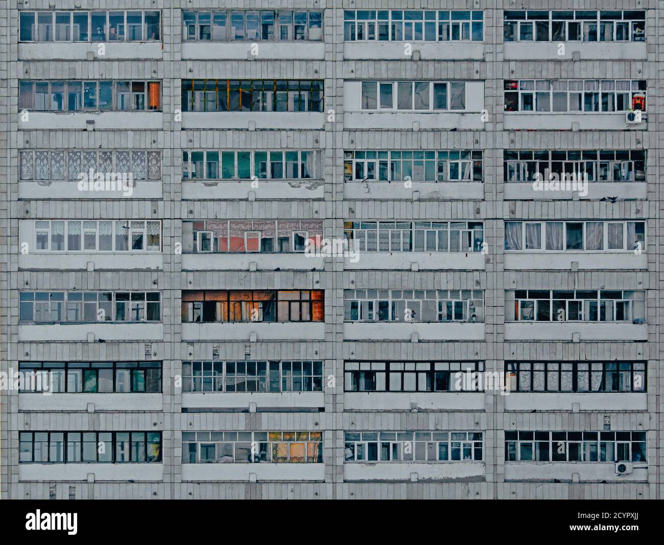 Facade of building in residential district. Soviet era block apartment ...