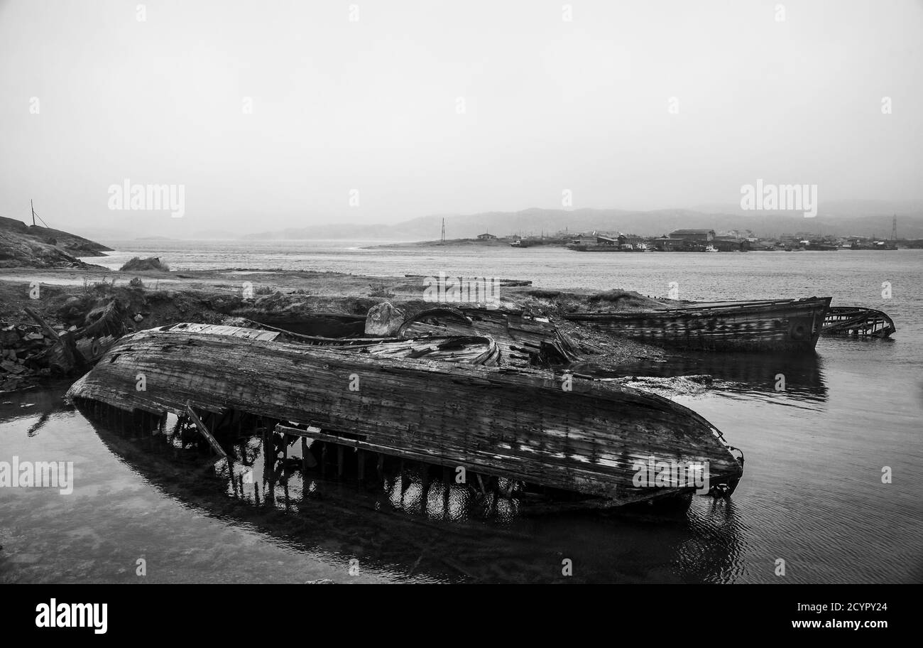 Ships graveyard in the water of the Barents Sea, Teriberka, Russia ...