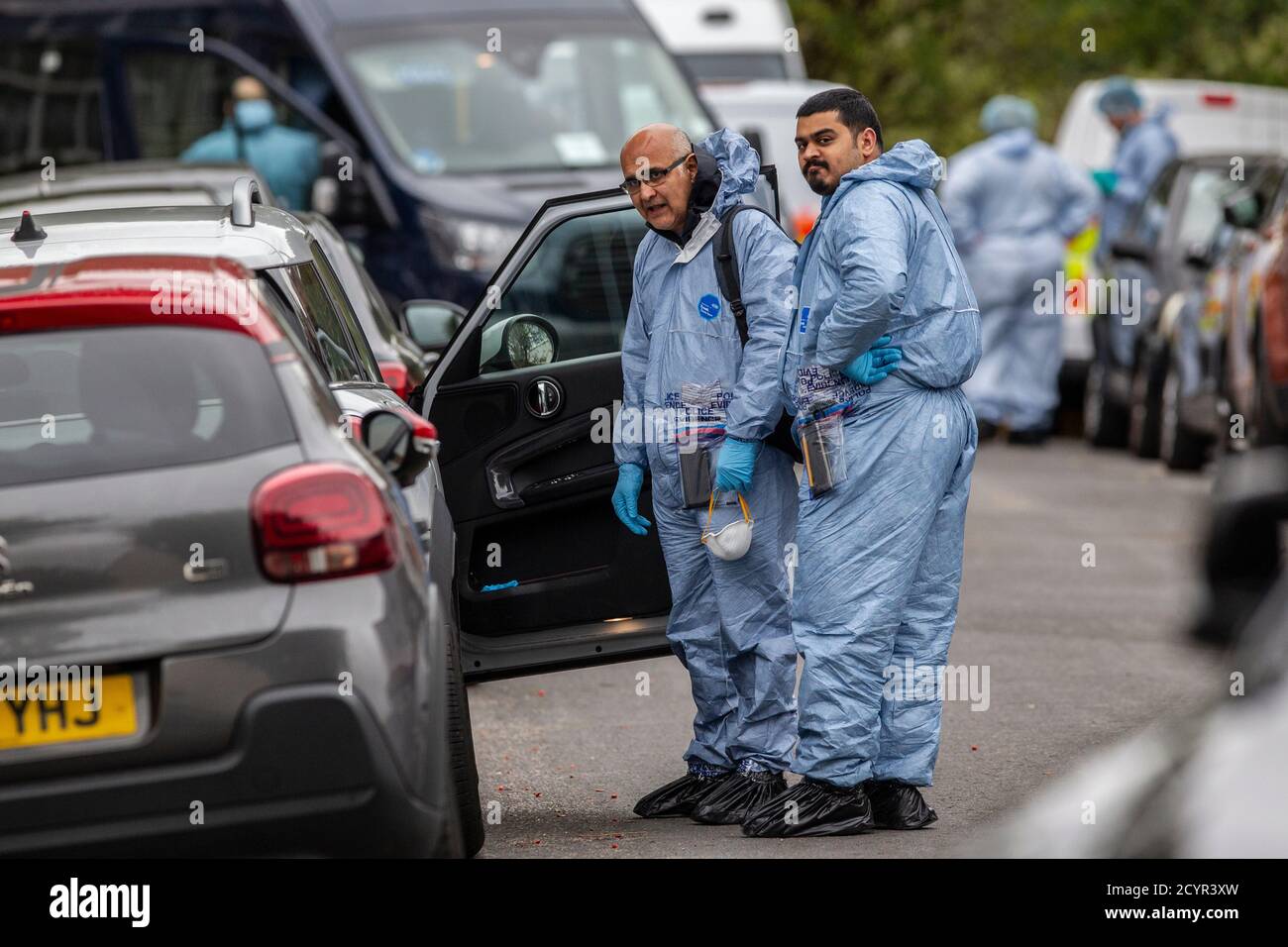 Metropolitan Police officers and Forensic officers outside the address ...