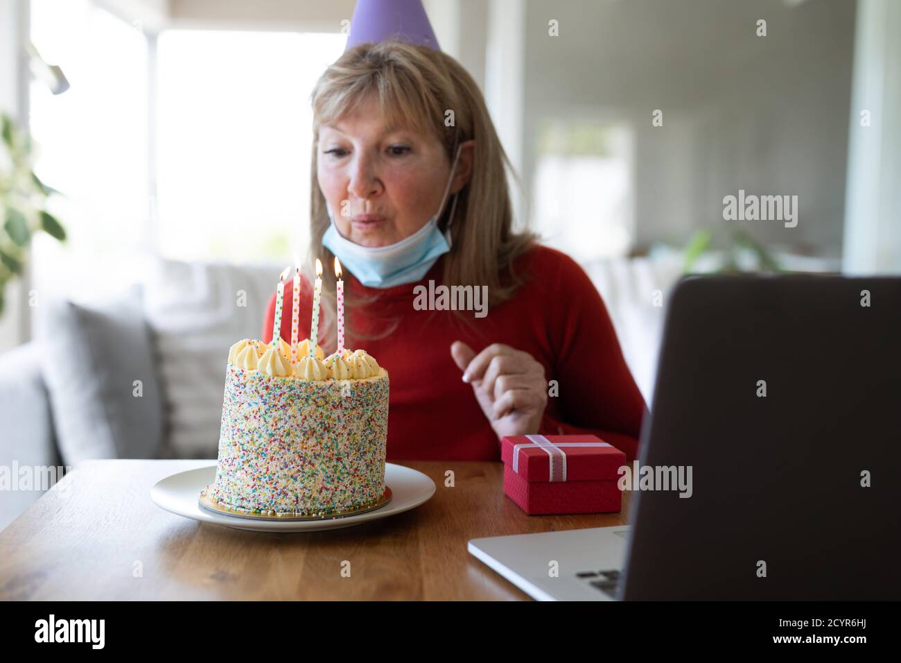 Senior Caucasian woman spending time at home, sitting in her living ...