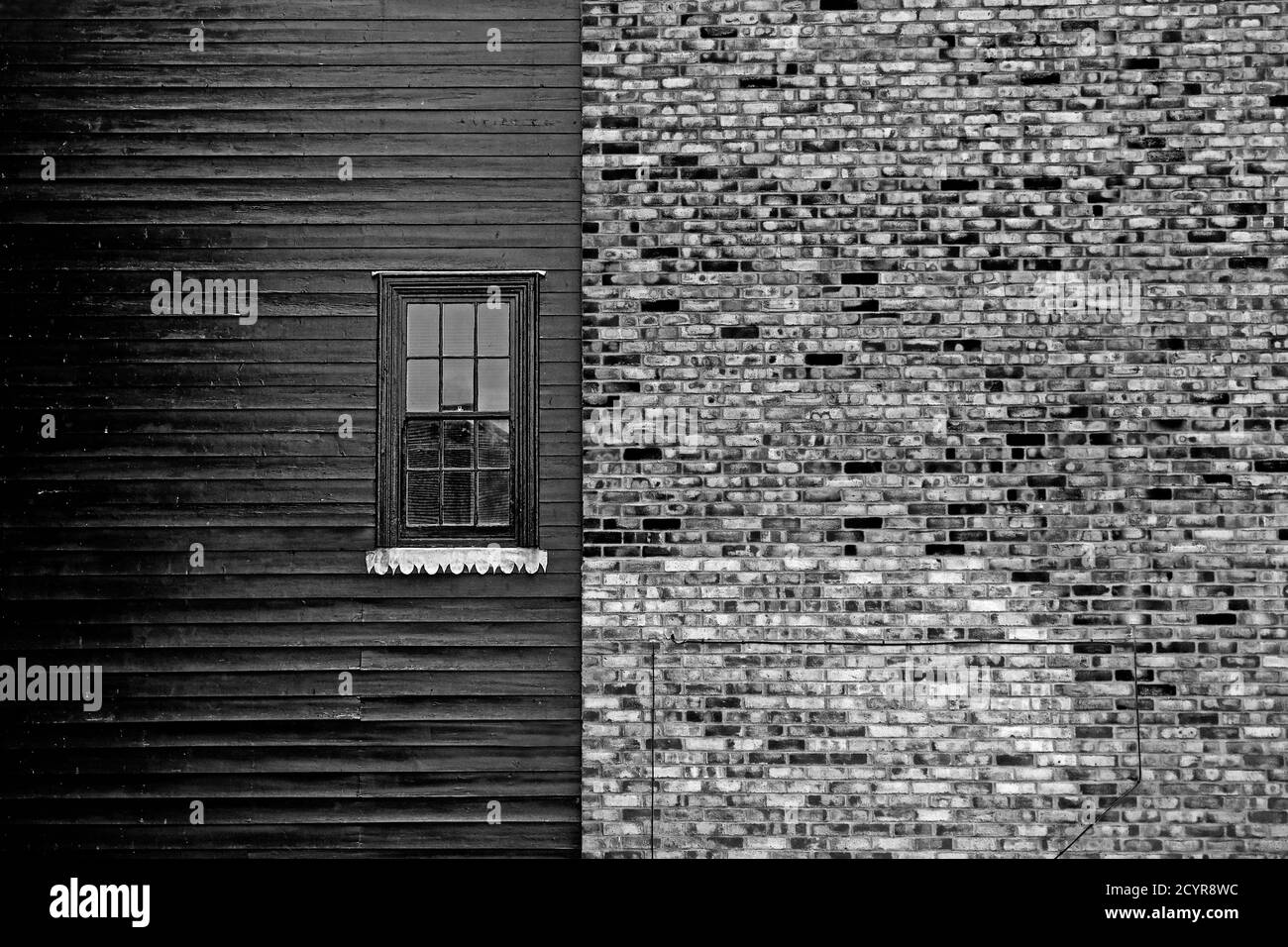 Timber and brick built house in mono Stock Photo - Alamy