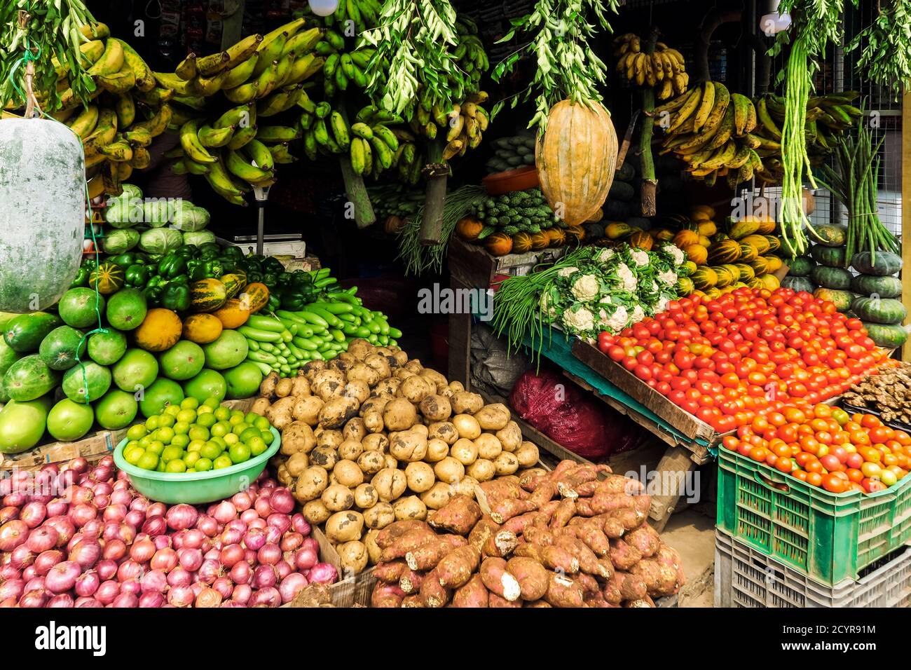 Plantains, marrow, onion, potato & other vegetables at a Main Rd ...