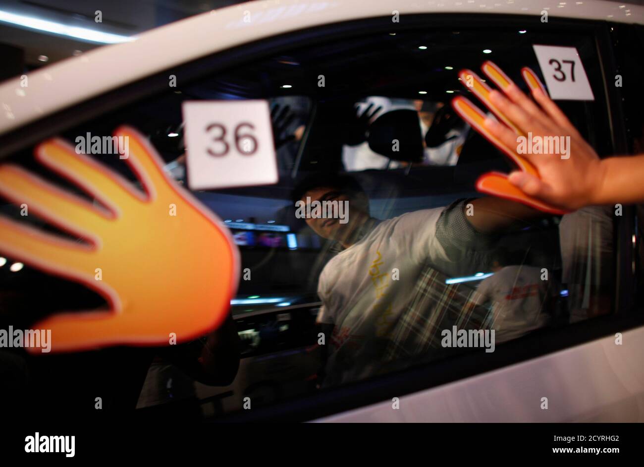 Hands pressed against window hi-res stock photography and images - Alamy