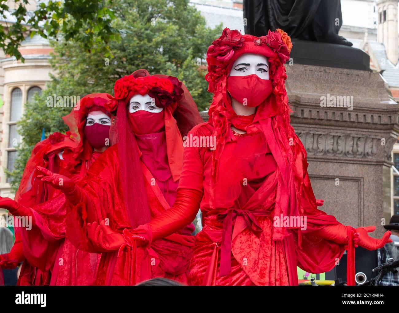 XR Red Rebels pose at first day of the Extinction Rebellion staged at ...