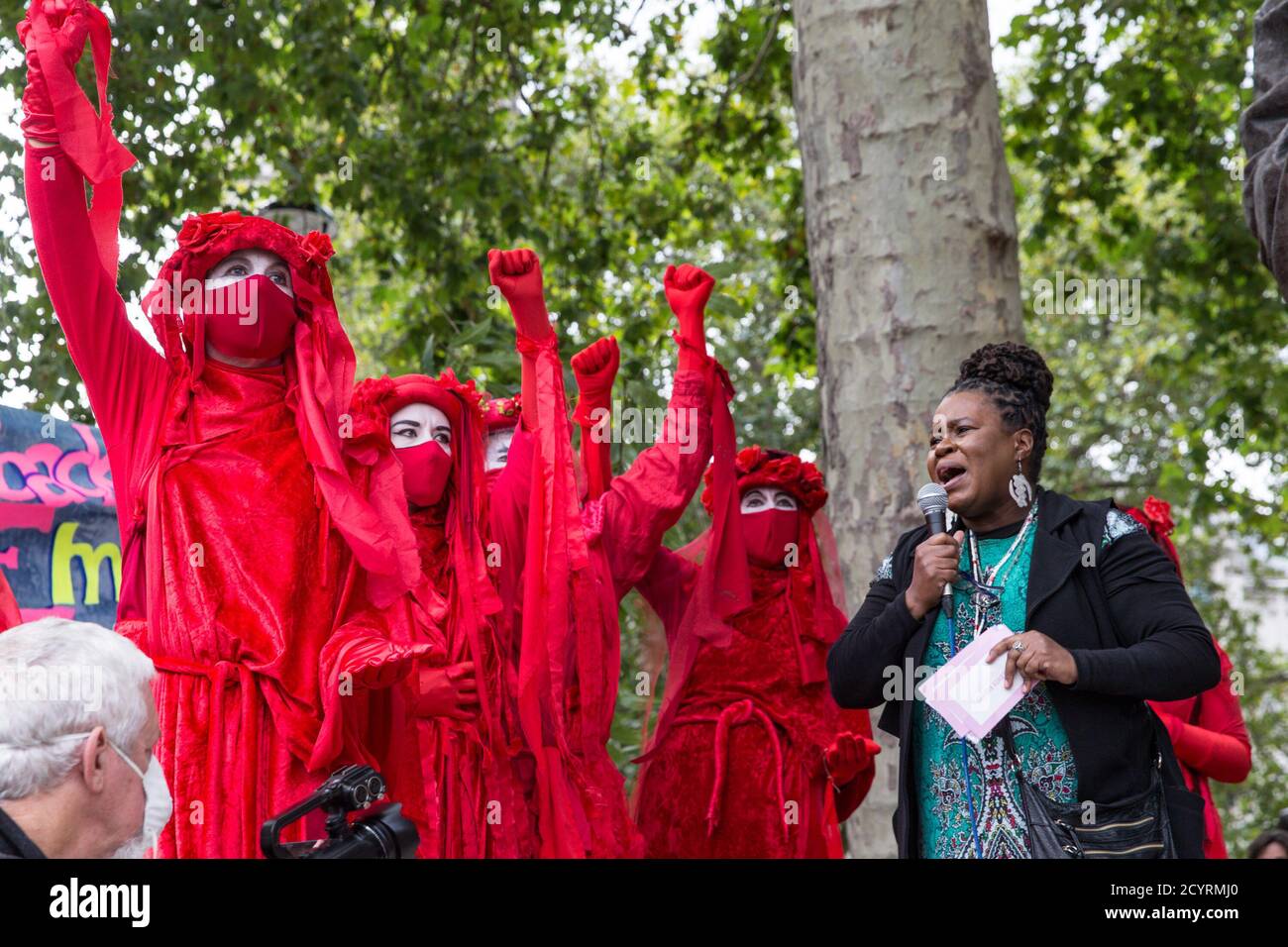 XR Red Rebels pose at first day of the Extinction Rebellion staged at ...