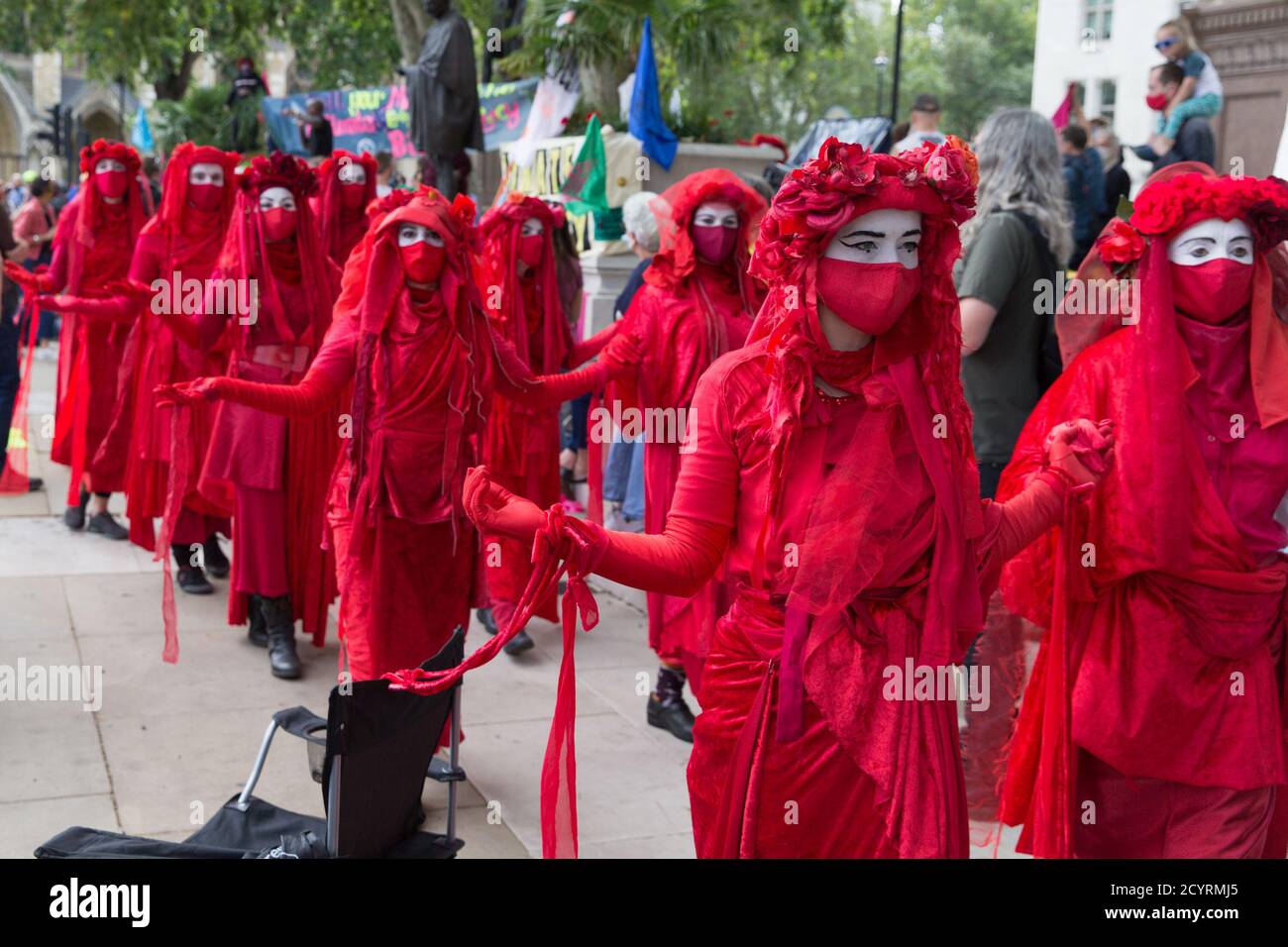 XR Red Rebels pose at first day of the Extinction Rebellion staged at ...