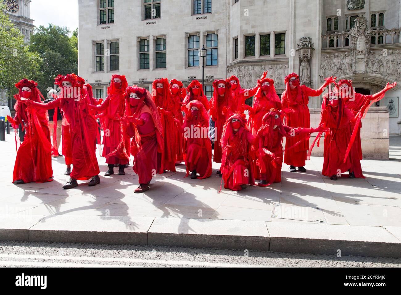 XR Red Rebels pose at first day of the Extinction Rebellion staged at ...