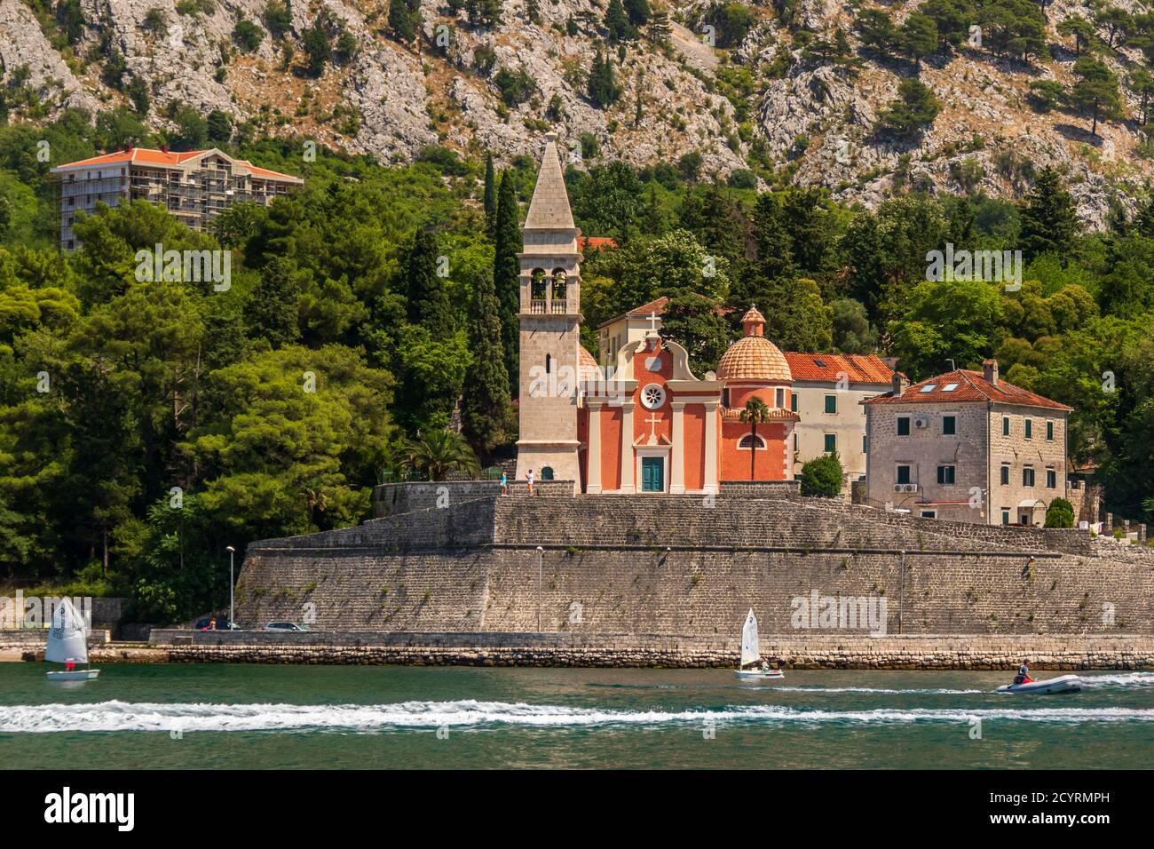 St Matthias Church, Dobrota, Montenegro, seen from bay of Kotor Stock ...
