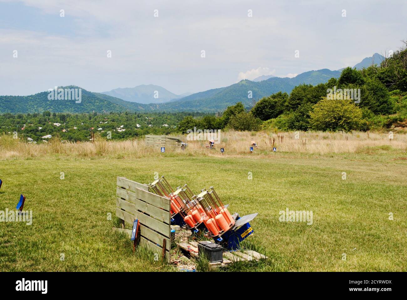Outdoor skeet shooting club with machine for launching clay pigeon for ...