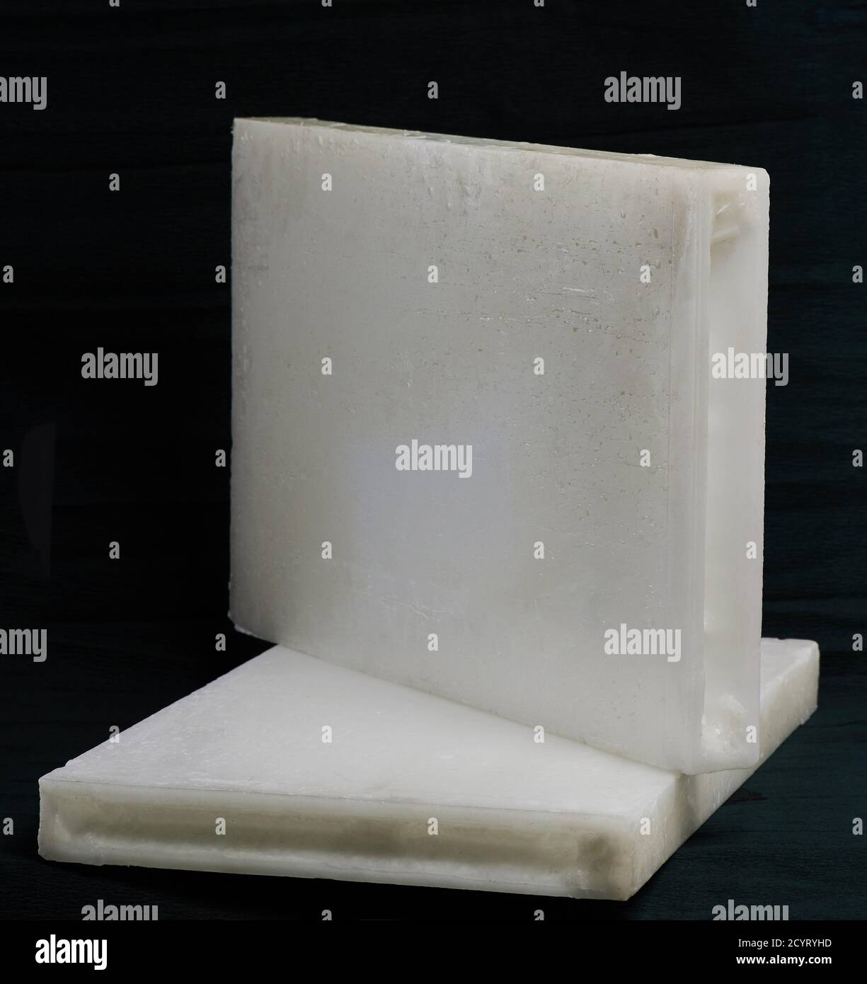 Industrial wax slab white color isolated on black background Stock ...