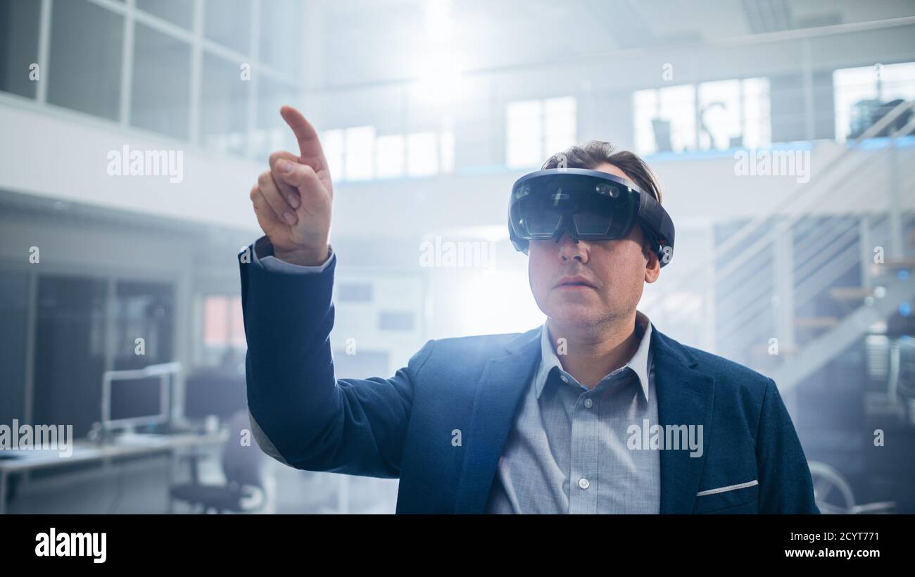 Automotive Engineer Using Augmented Reality Headset Making Touching ...