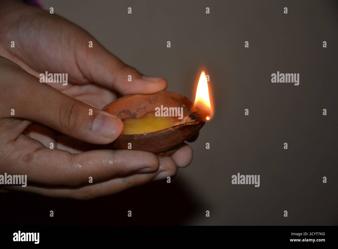 Oil lamps with flame. deepawali or diwali is celebrated by hindus by ...