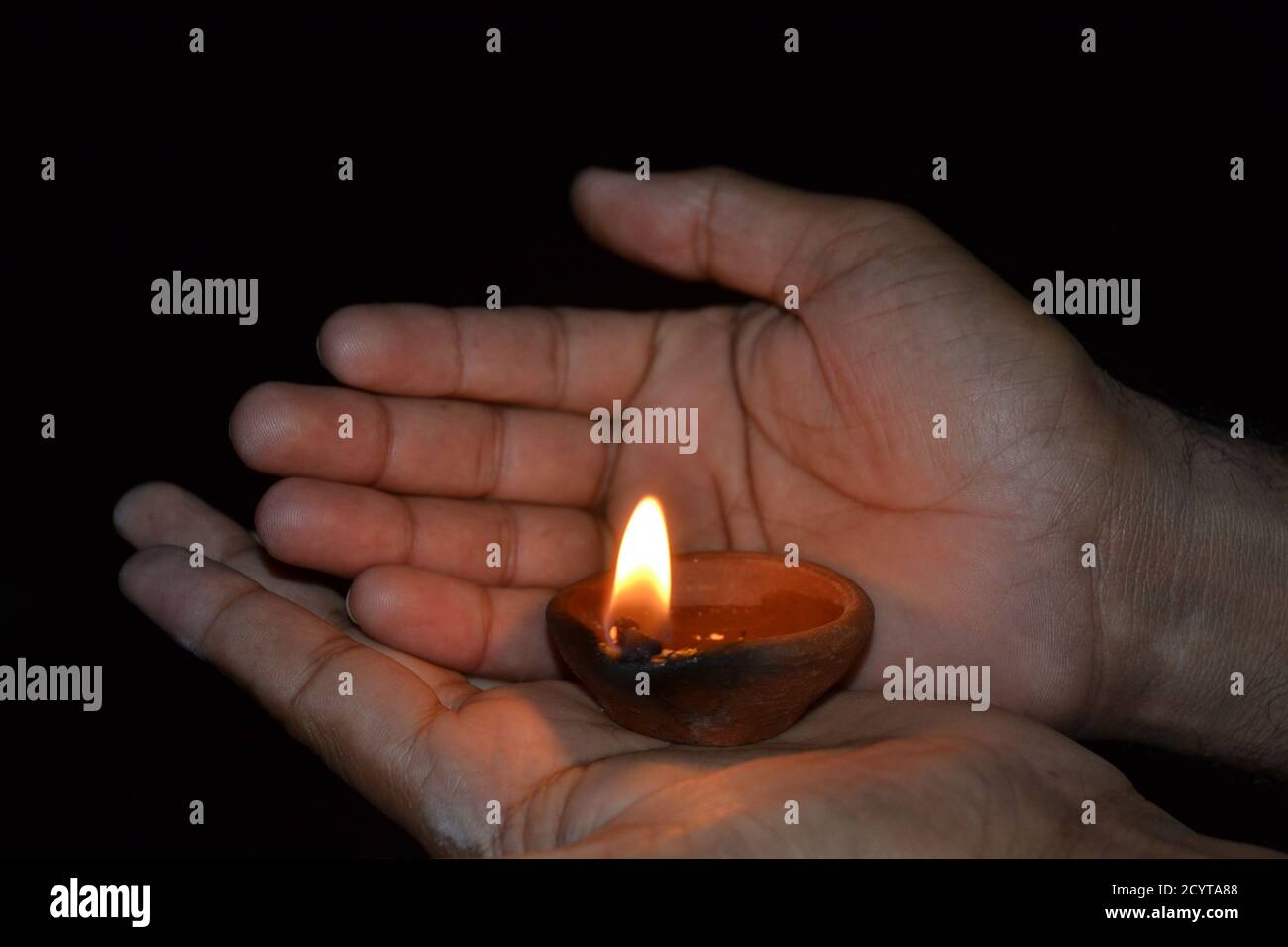 Oil lamps with flame. deepawali or diwali is celebrated by hindus by ...