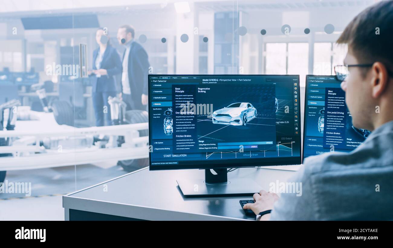 Professional Engineer Works on a Computer with a 3D CAD Software and ...