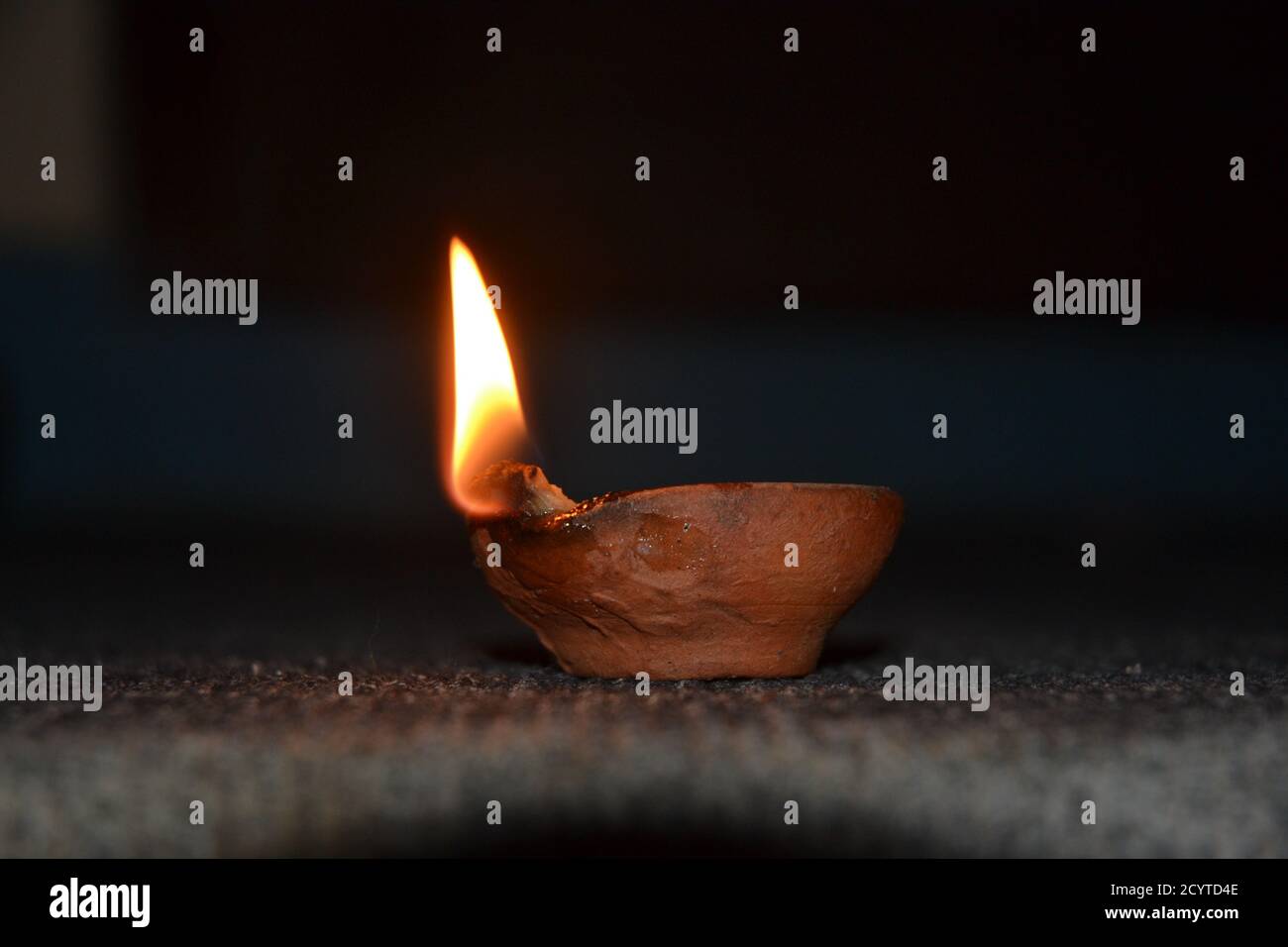 Oil lamps with flame. deepawali or diwali is celebrated by hindus by ...