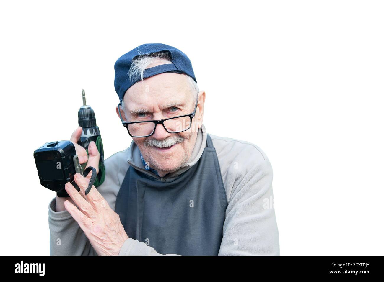 Happy old man posing with an electric screwdriver, smiling. Old farmer ...