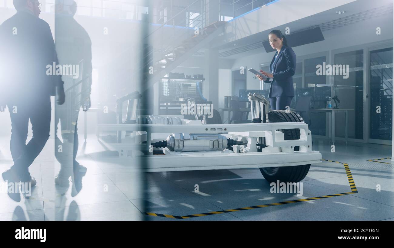 Beautiful Female Engineer Scans Electric Car Chassis Prototype with ...
