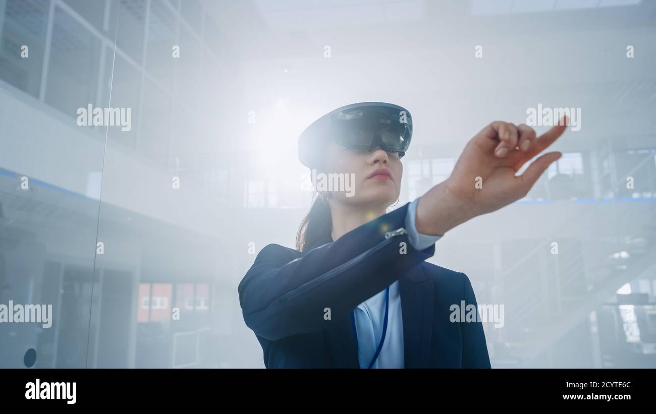 Female engineer using augmented hi-res stock photography and images - Alamy