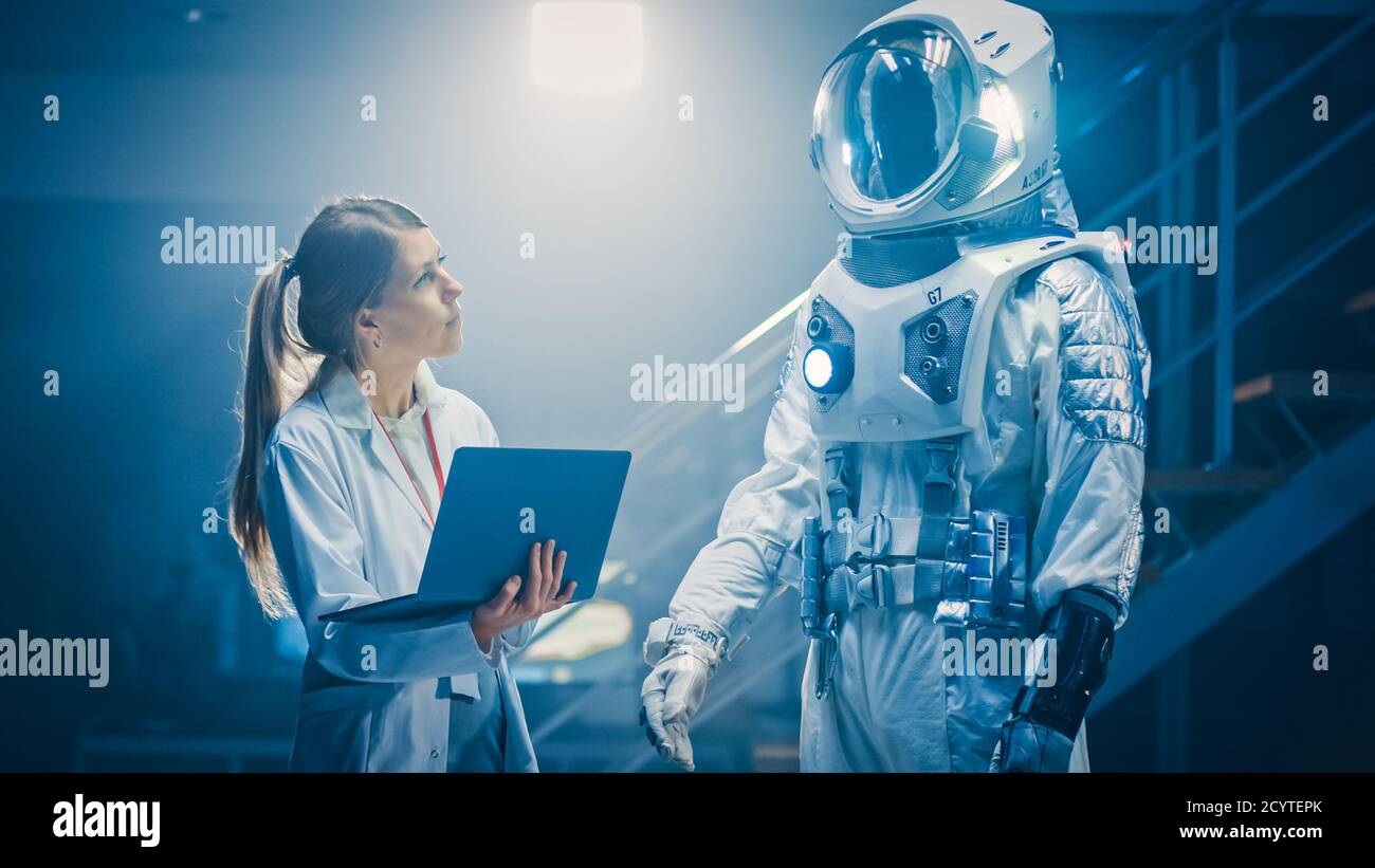 Shot of an Aerospace Scientist Wearing White Coat Use Computer for ...