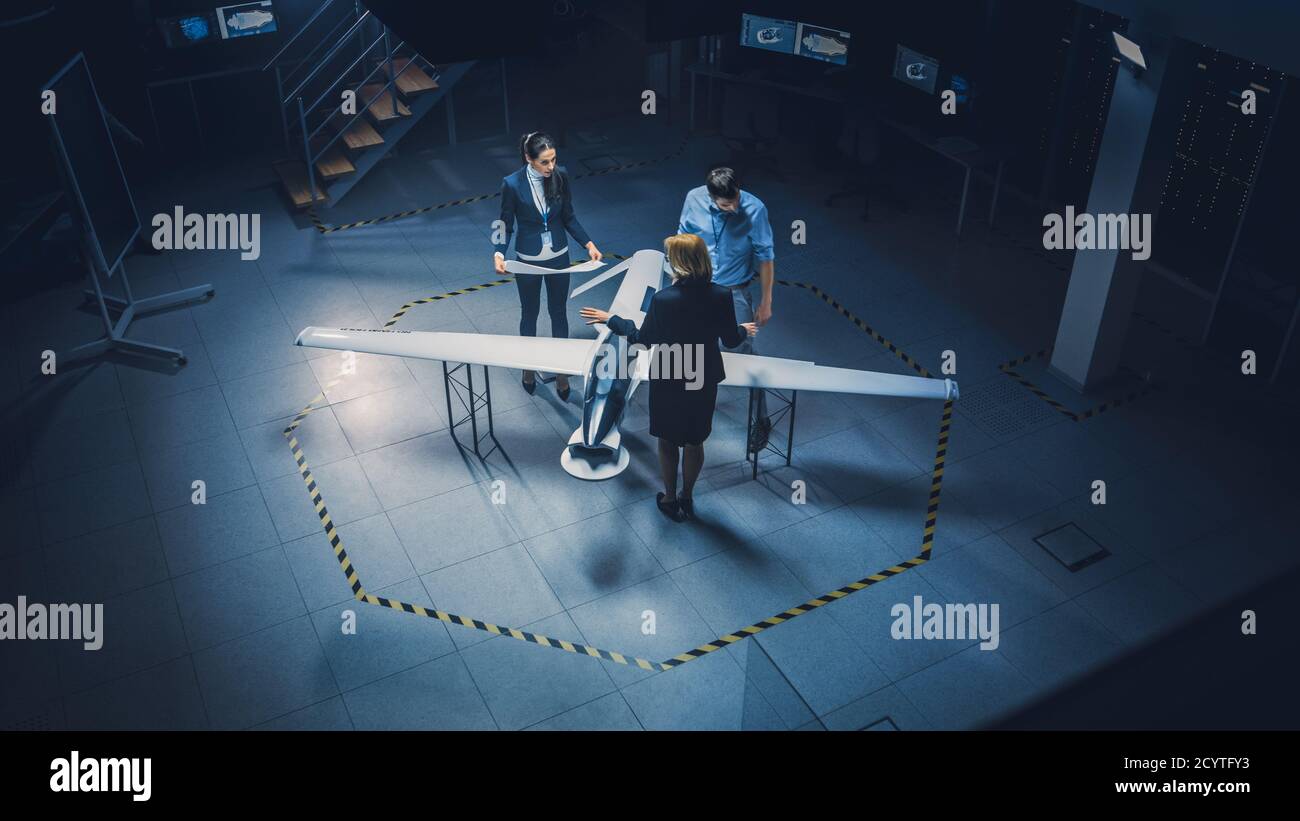 Team of Industrial Aerospace Engineers Work On Unmanned Aerial Vehicle ...