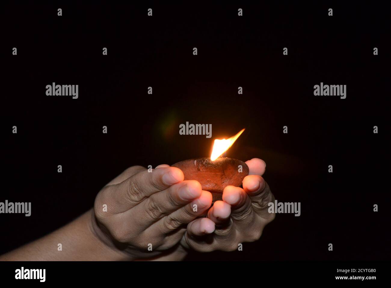 Oil lamps with flame. deepawali or diwali is celebrated by hindus by ...