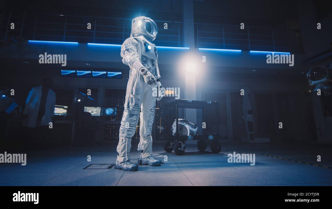 Low Angle Shot of an Astronaut Space Suit Adapted for Space and Travel ...